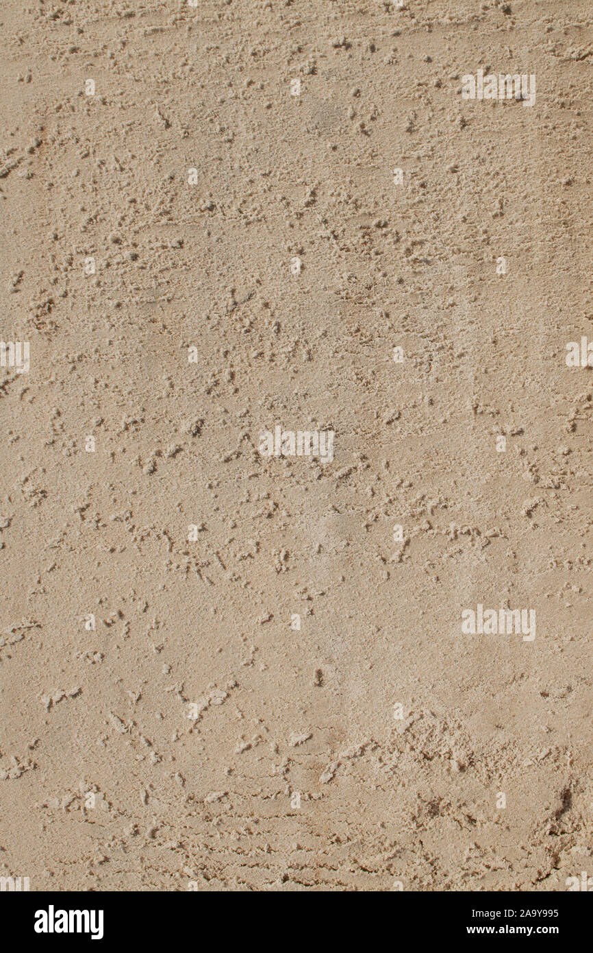 Wet sand texture in the sea shore beach - retro, vintage style look ...