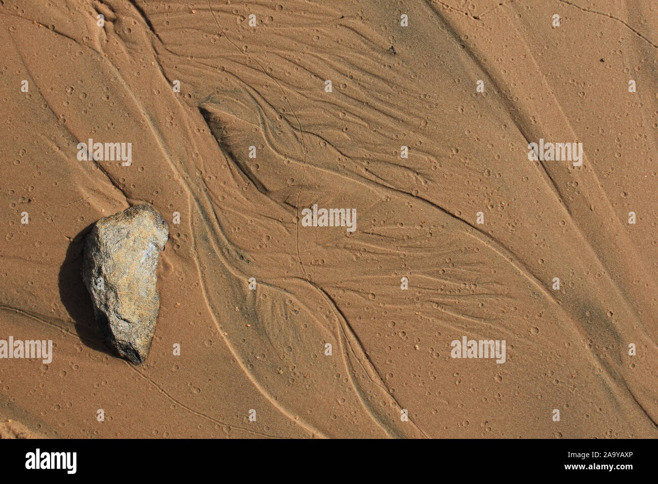Natural pattern on sand Stock Photo - Alamy