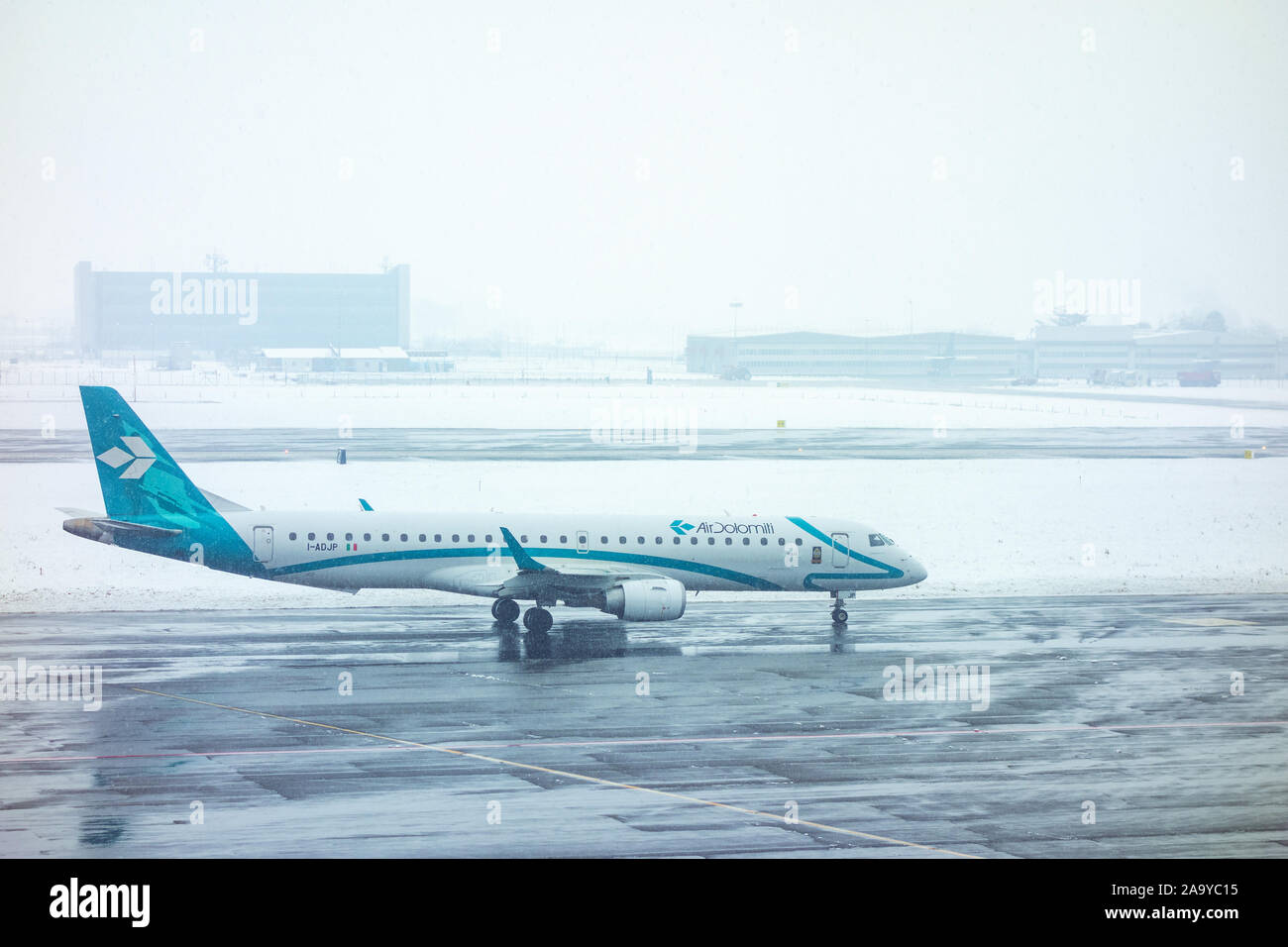 Aircraft ready to take off in a blizzard at torino caselle airport ...