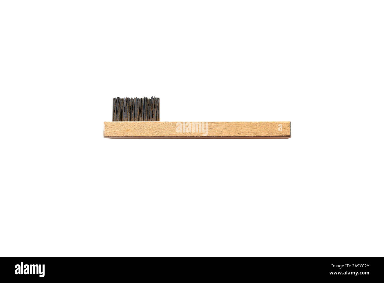 Short, wire brush with a wooden handle, isolated on a white background ...