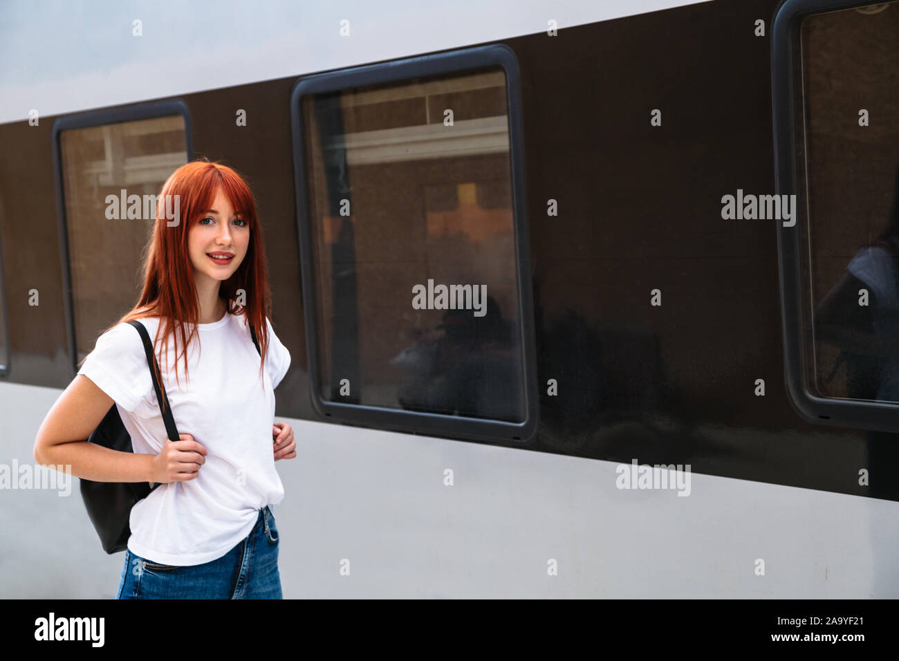 Woman on suburban train hi-res stock photography and images - Alamy