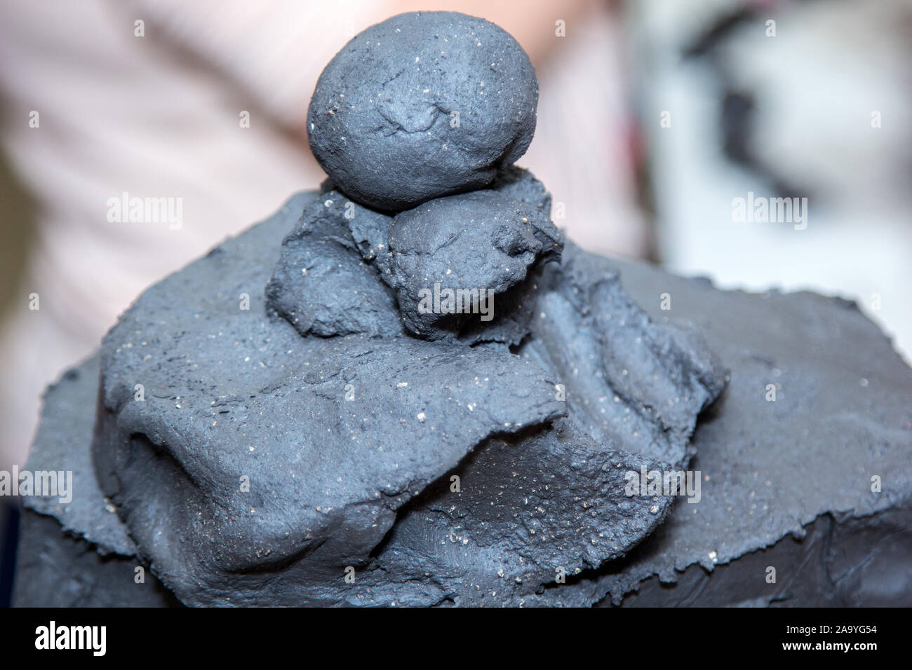 pile of gray clay for modeling Stock Photo - Alamy