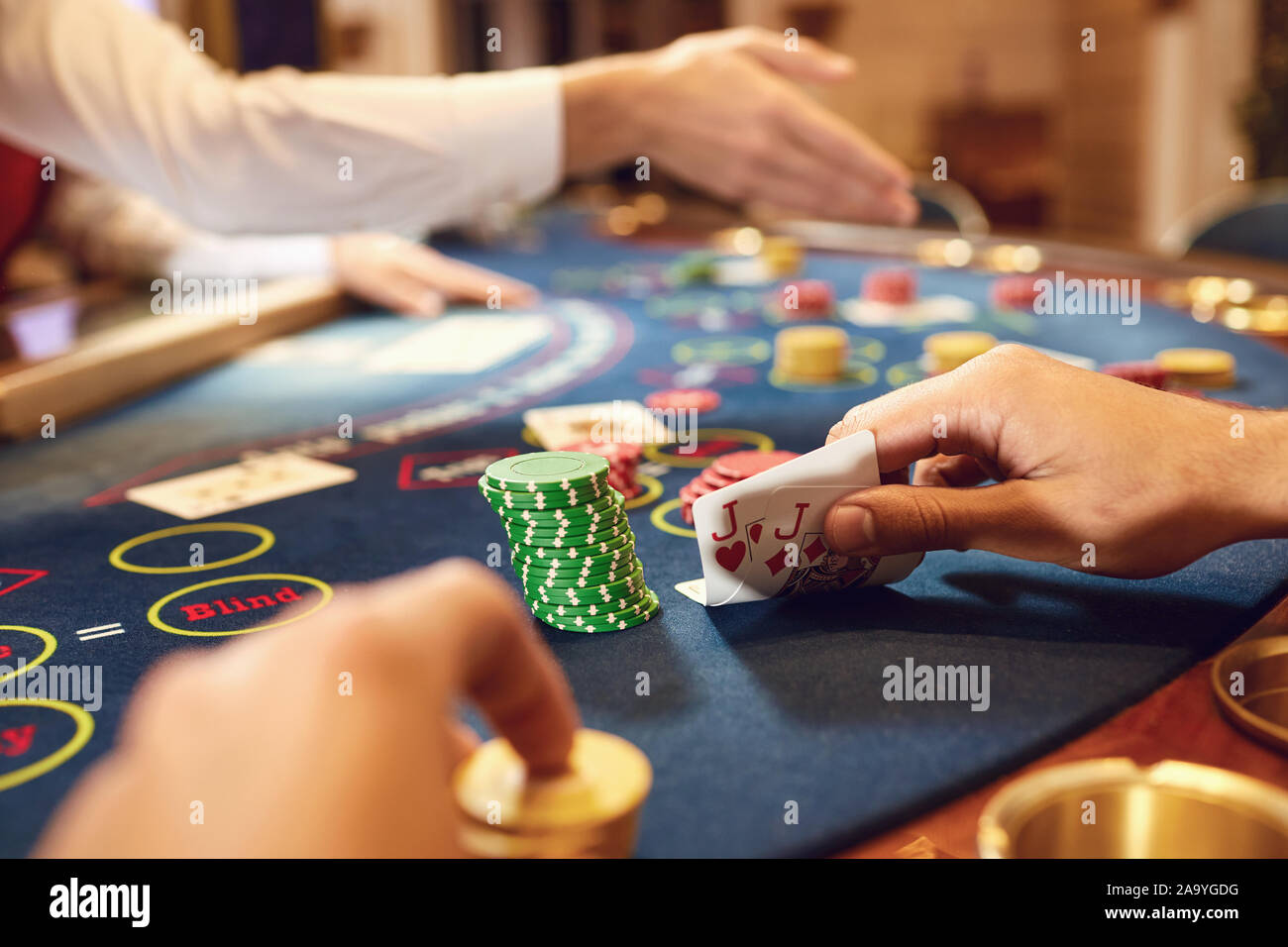 Poker table and player hi-res stock photography and images - Alamy