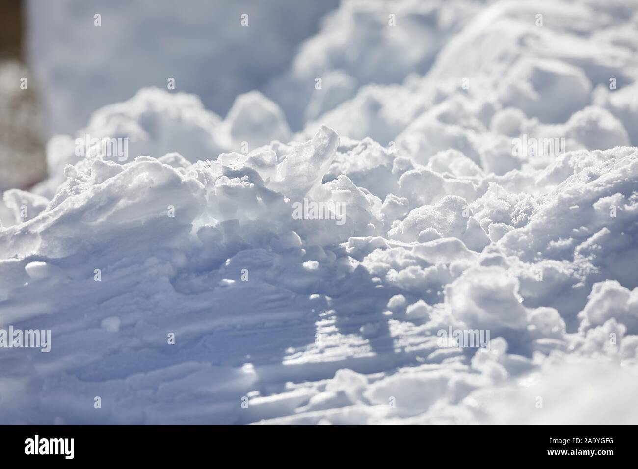 Snow detail glimmering in sunlight Stock Photo - Alamy