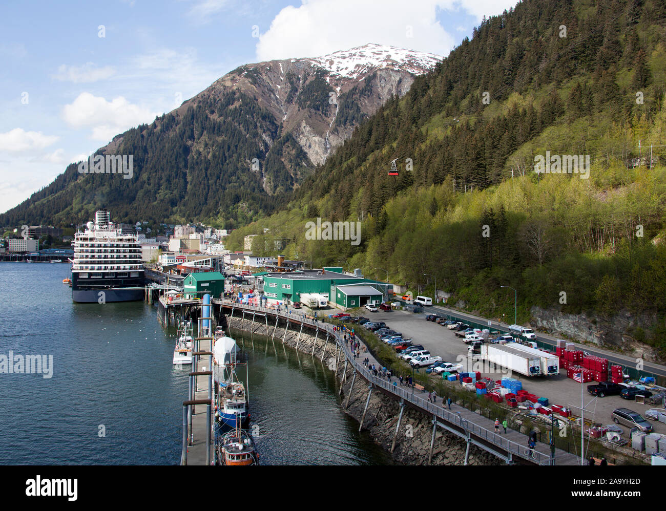 The view of Juneau town harbor and Juneau mountain in a background ...