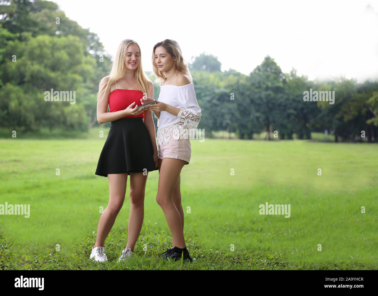 Female friends having fun on day out Stock Photo - Alamy