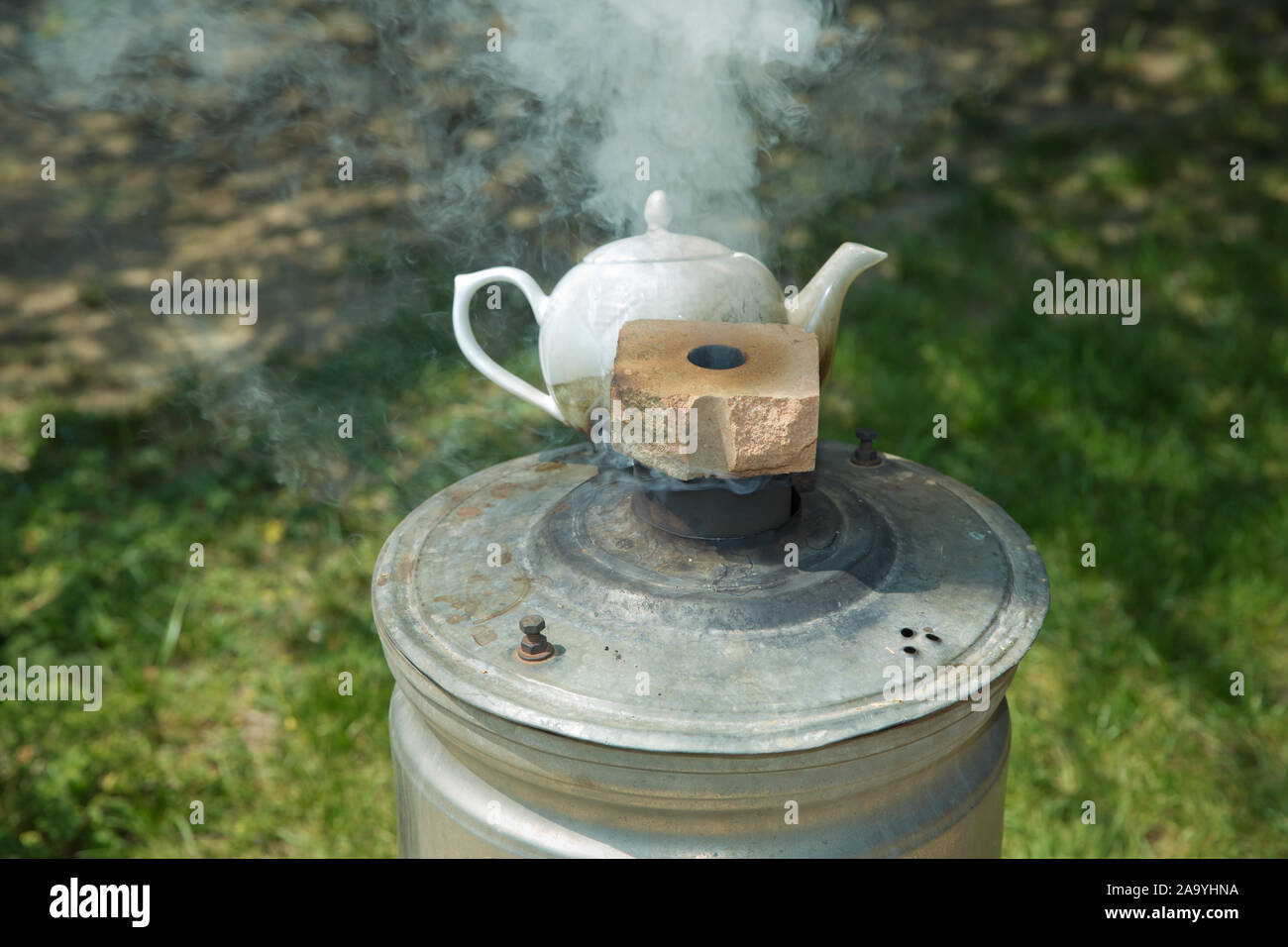Azerbaijan samovar outdoor. Preparing tea outside on the nature on ...