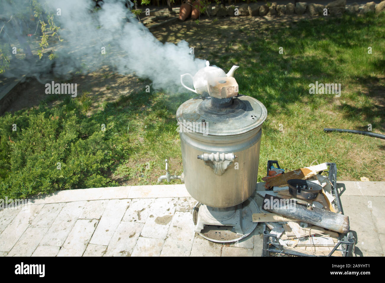 Azerbaijan samovar outdoor. Preparing tea outside on the nature on ...