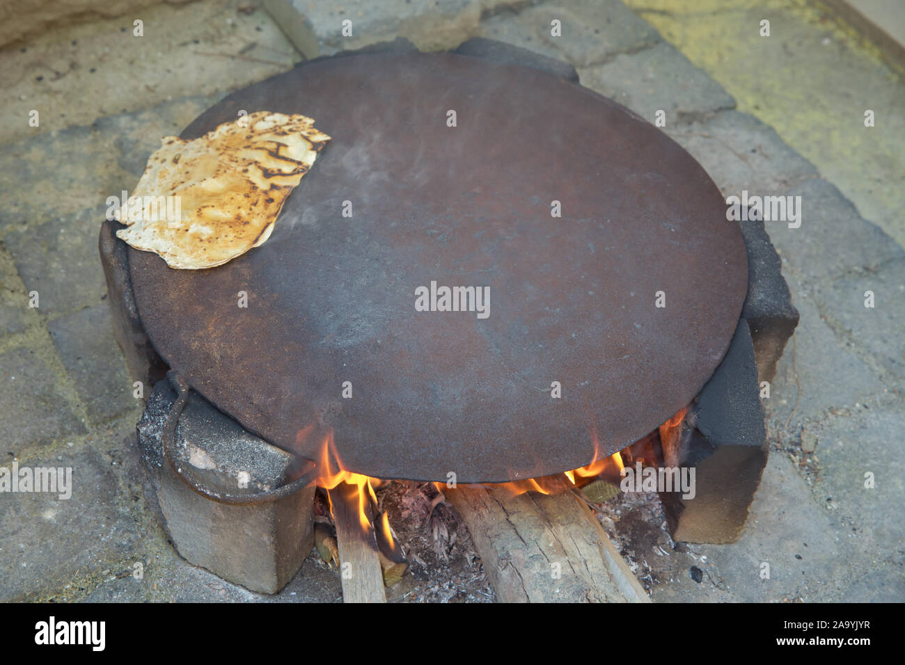 outdoor oven Traditional way of baking bread , Tava, Tabun oven Arabic ...