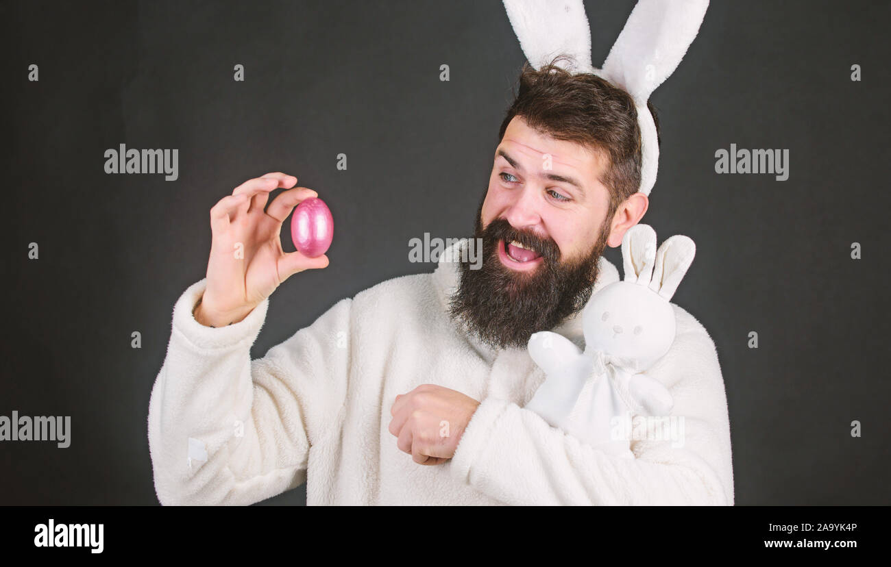 Easter activities concept. Egg hunt game. Guy bearded hipster cute ...