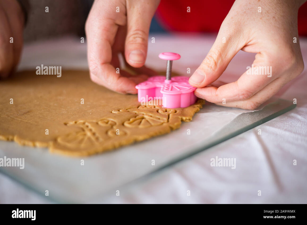 the process of making biscuits, shortbread dough raw, cut shape, sweet ...