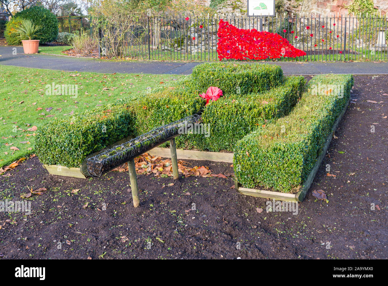 Box hedge topiary sculpted to look like a tank as part of the ...