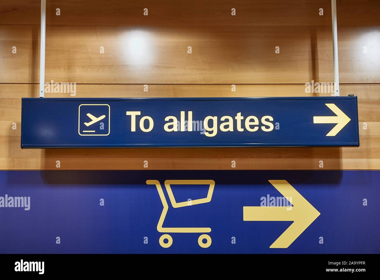 Airport terminal direction signs Stock Photo - Alamy