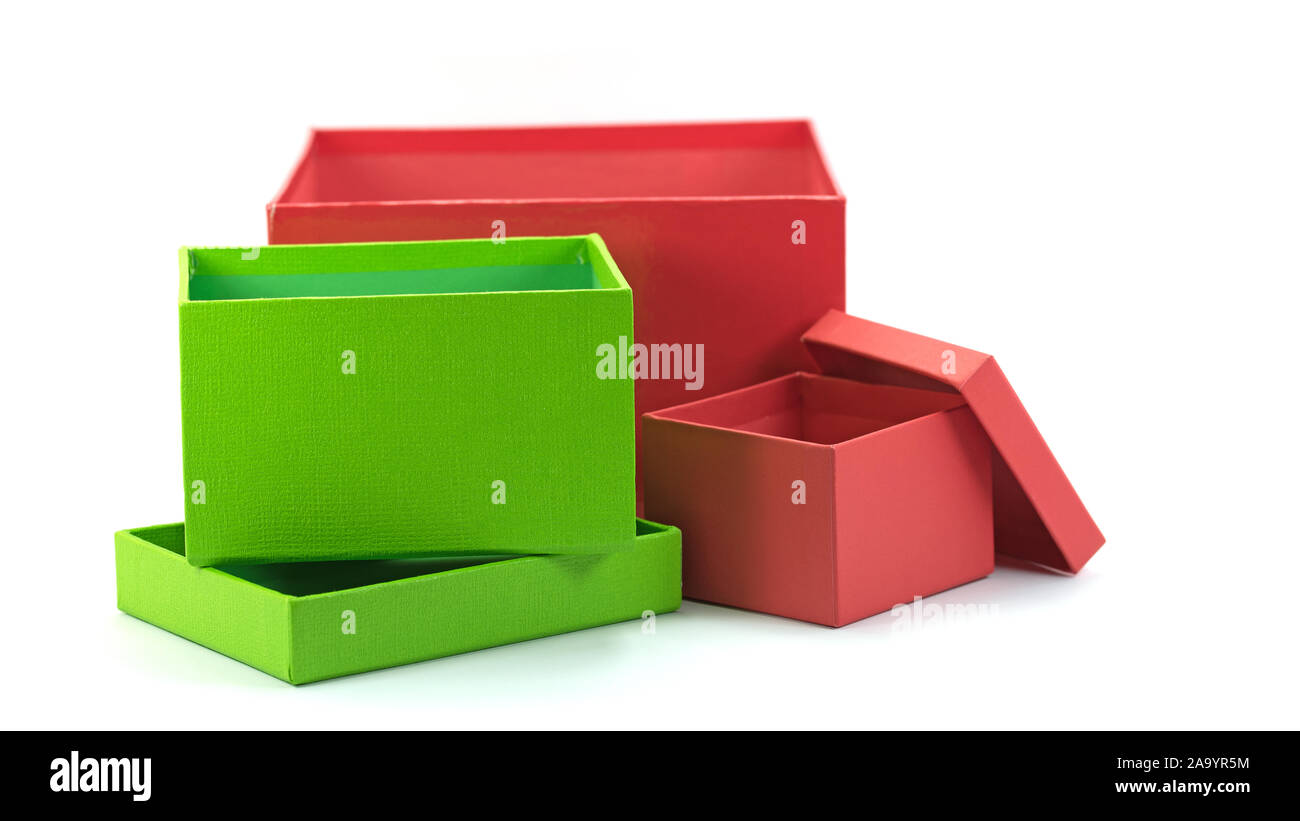 Red and green cardboard boxes in front of white background Stock Photo ...
