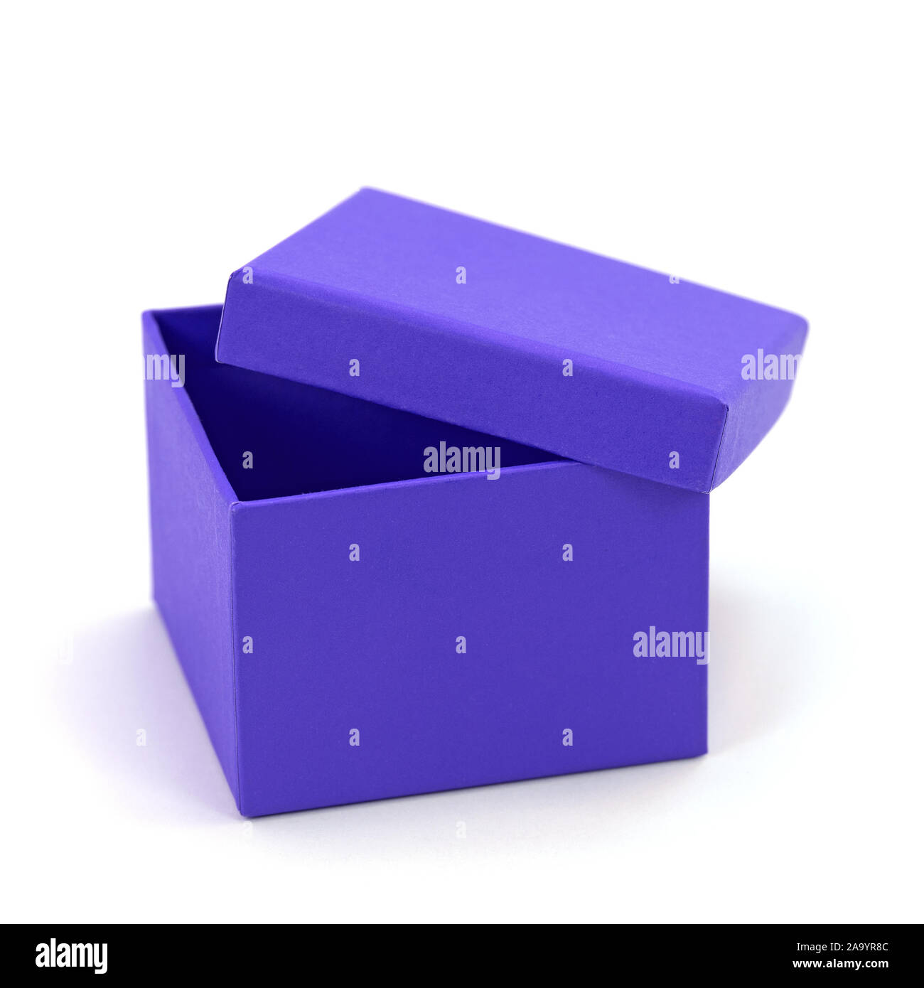 Blue empty cardboard box in front of white background Stock Photo - Alamy