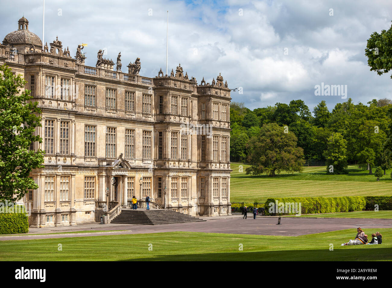 Family seating in the lawn garden in Longleat House, Wiltshire, England ...