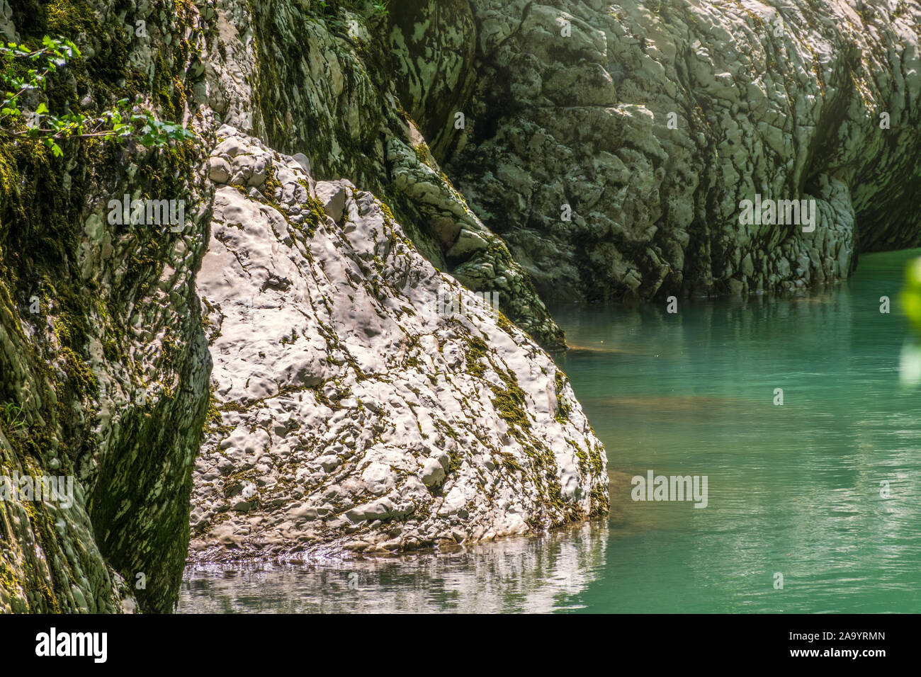 Transparent clear mountain river in a stone gorge. Mountain river with ...