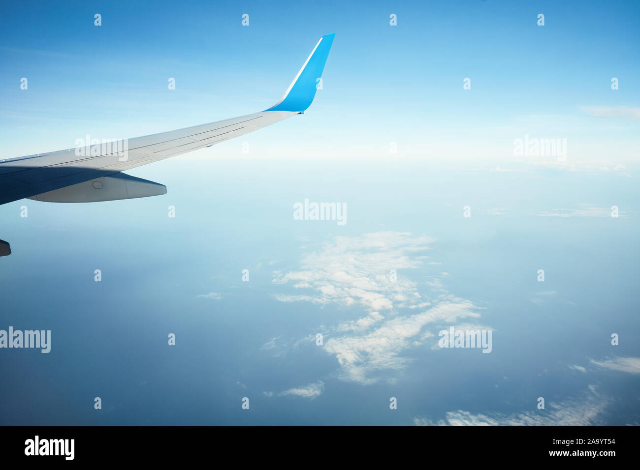 Aircraft wing in the sky Stock Photo - Alamy