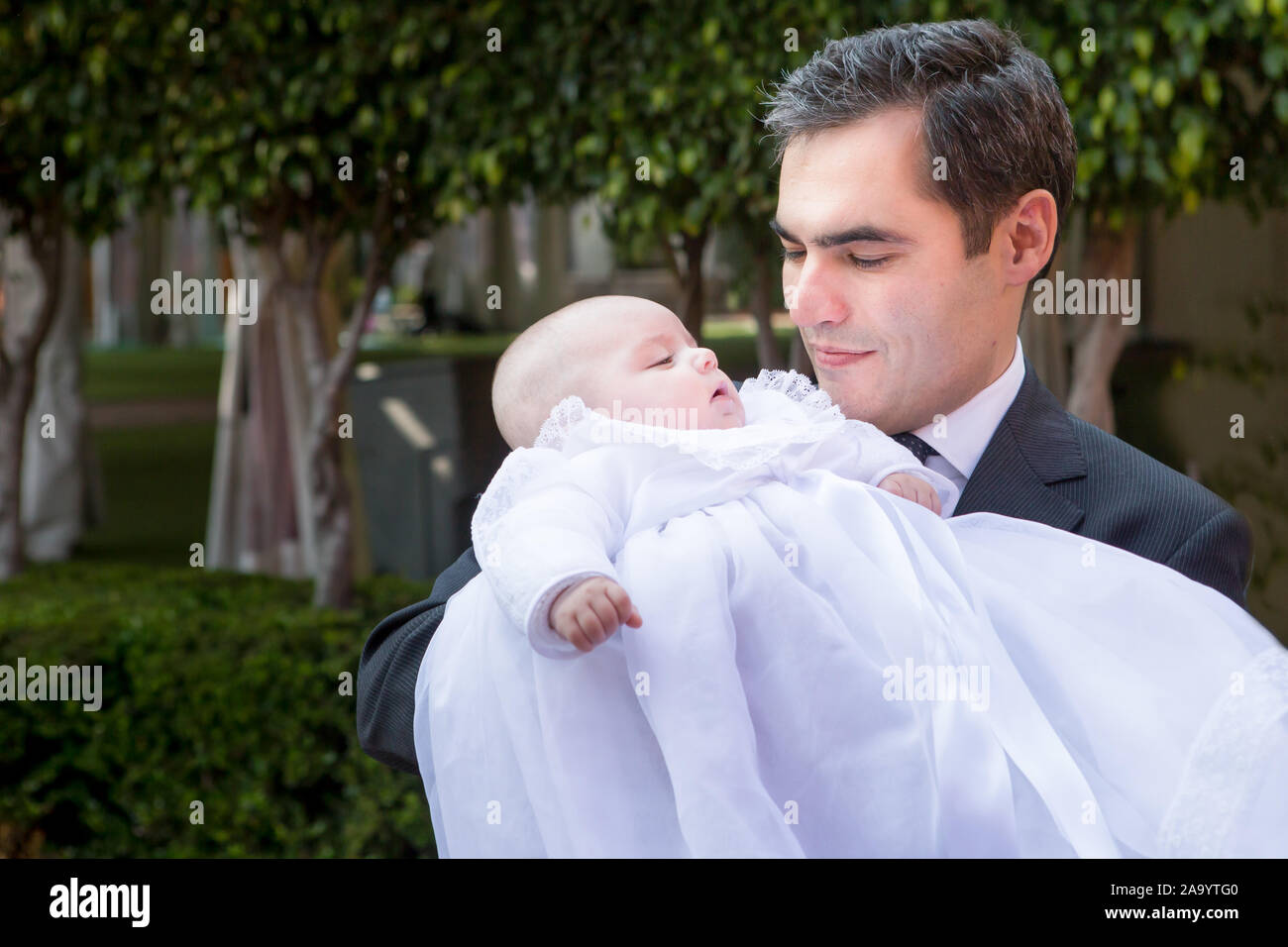 Father looking at adorable baby Stock Photo - Alamy