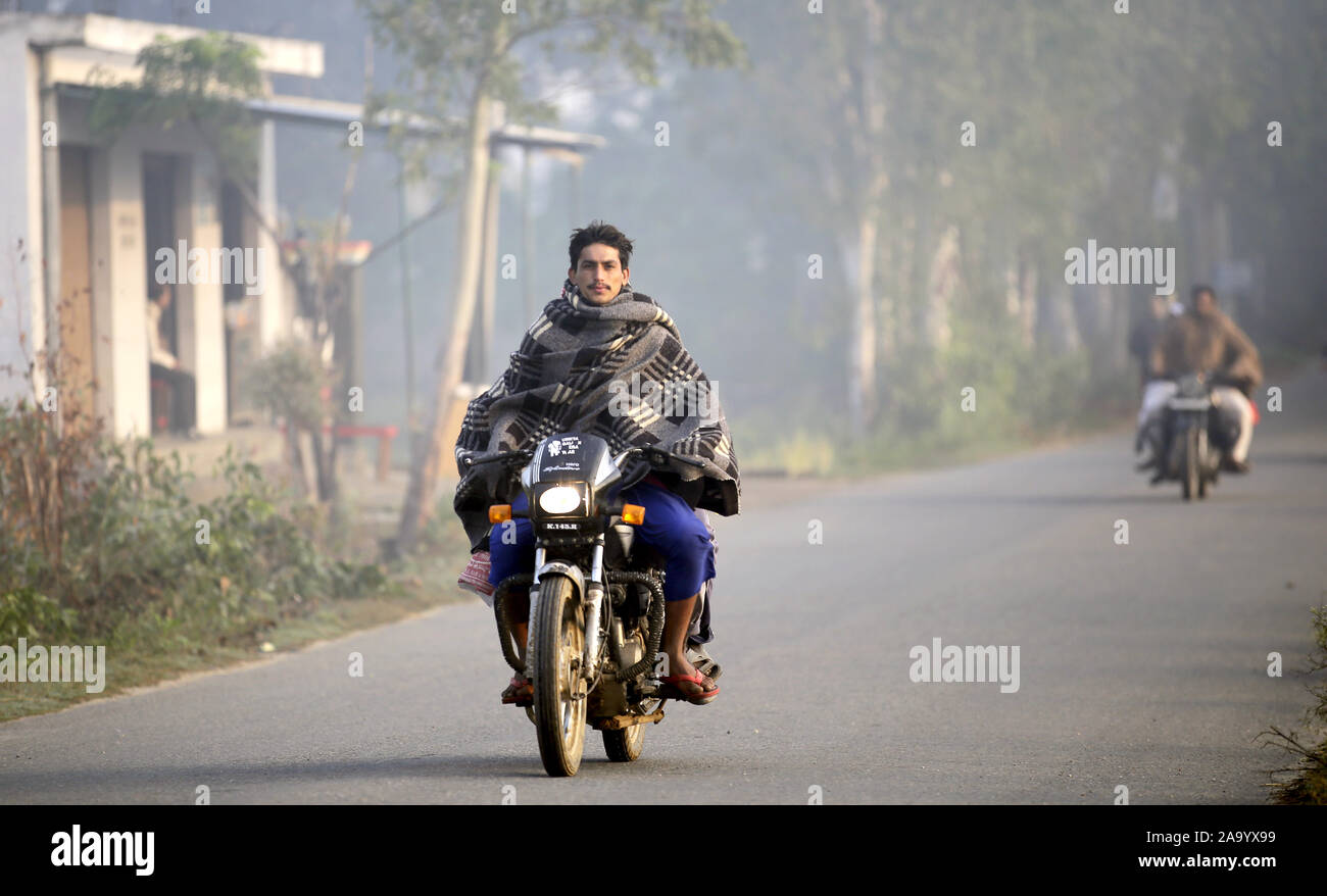 Indian man rides on motorcycle hi-res stock photography and images - Alamy