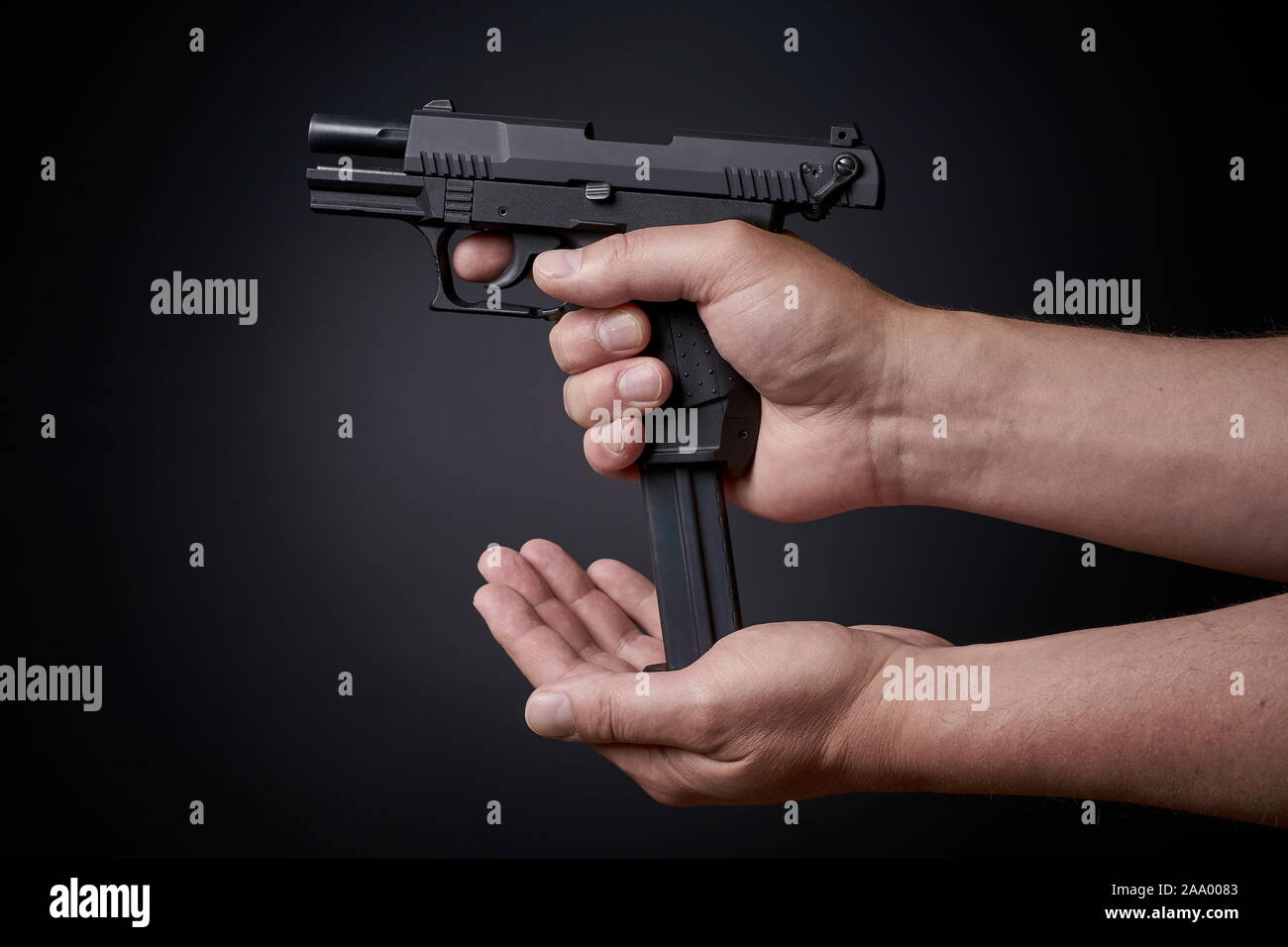 Load a pistol hi-res stock photography and images - Alamy