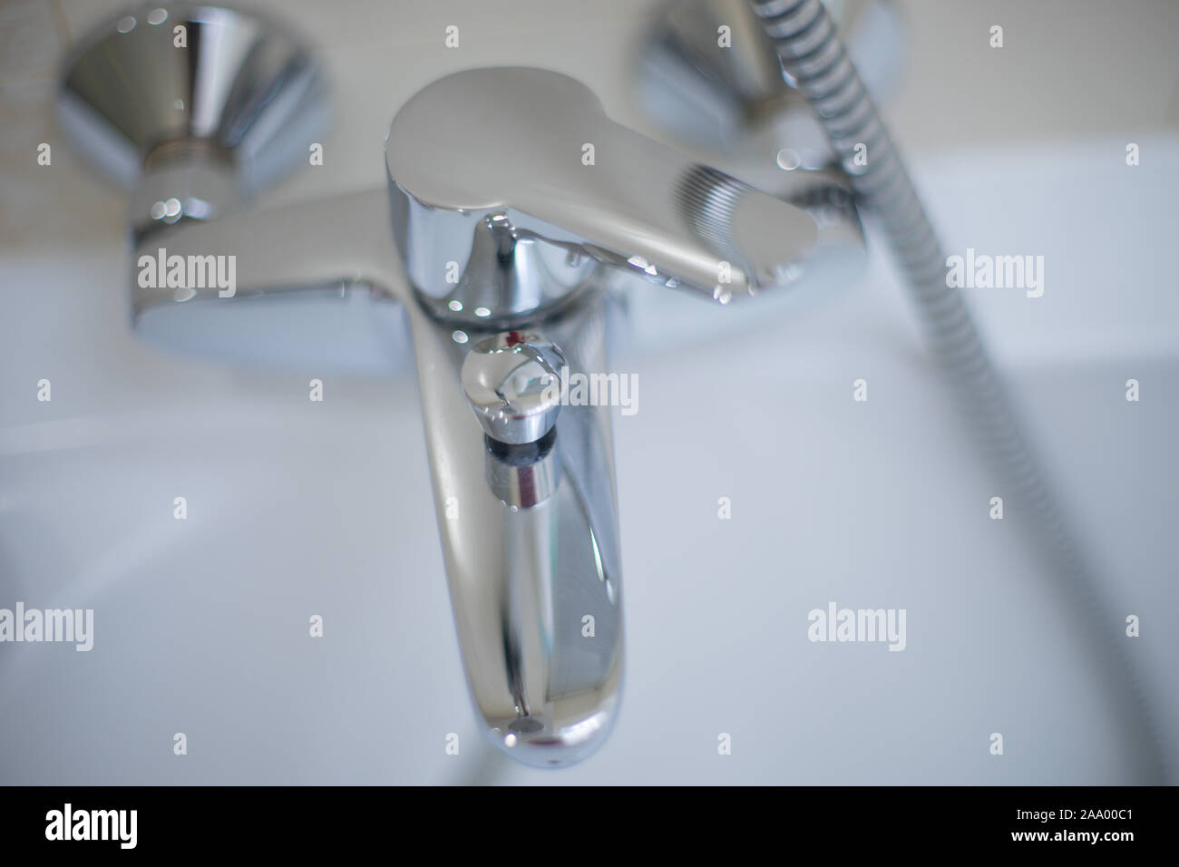 Chrome water tap, top view. Shiny faucet closeup Stock Photo - Alamy