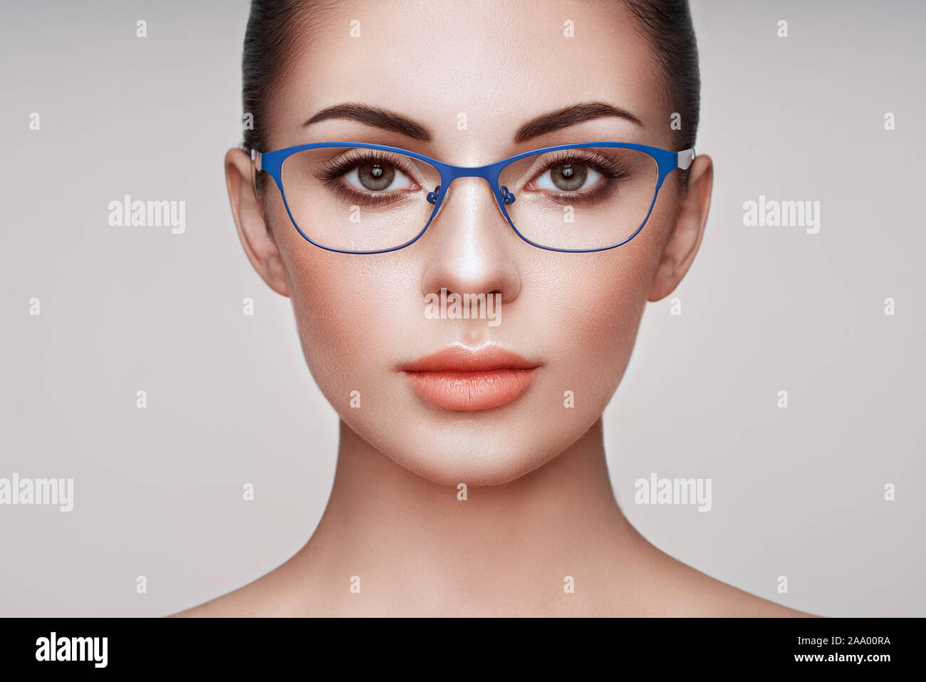 Woman with long eyelashes in eyeglasses. Vision correction. Poor ...