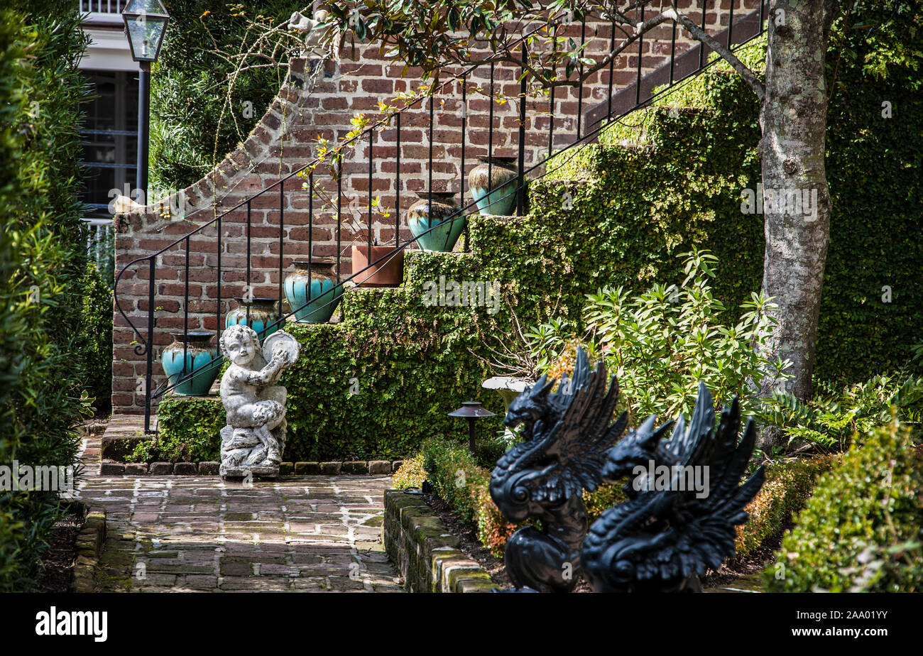 House garden border urns planter pots on steps, Charleston, South ...