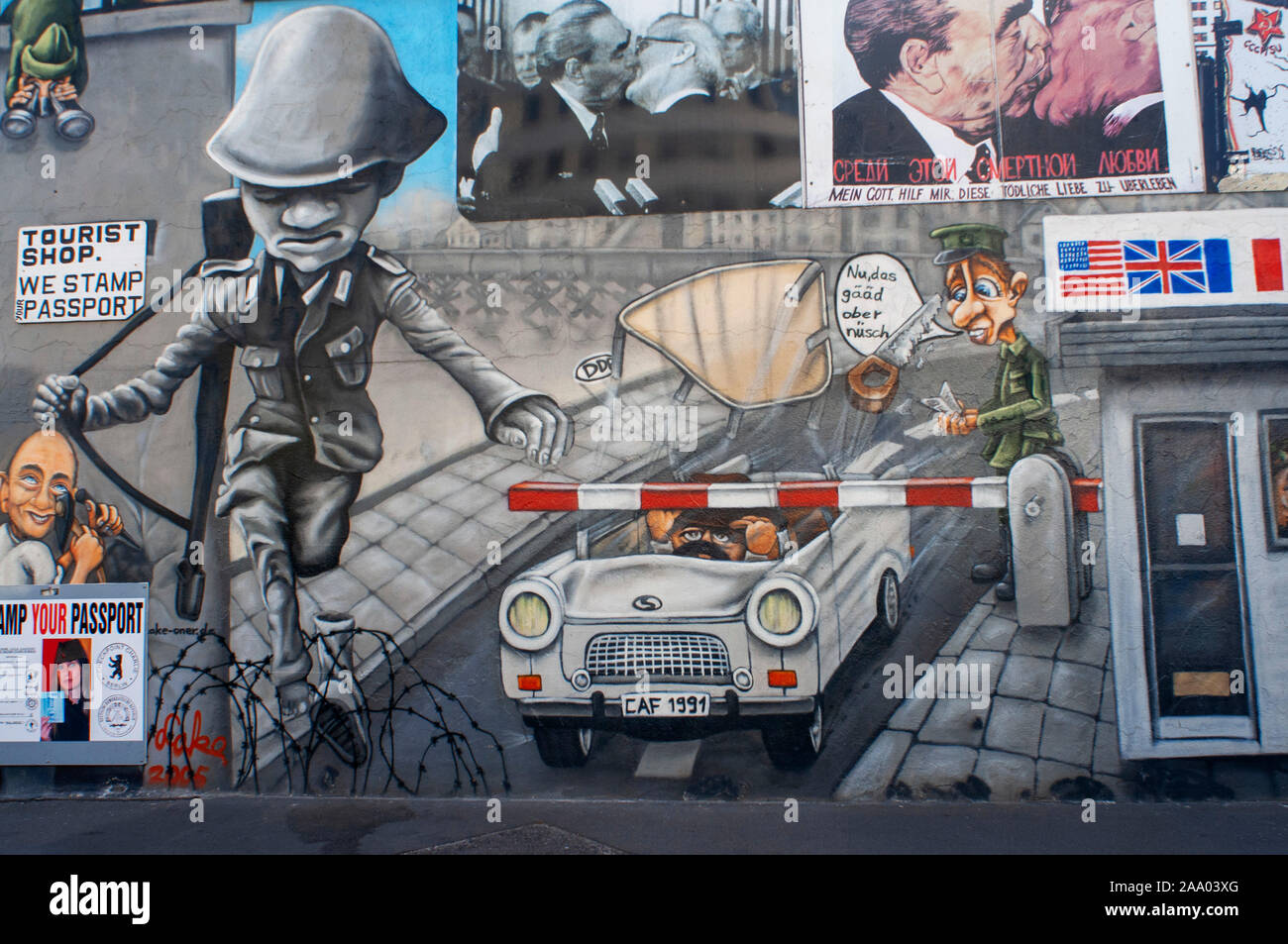 Graffiti on original section of Berlin Wall at the East Side Gallery in ...