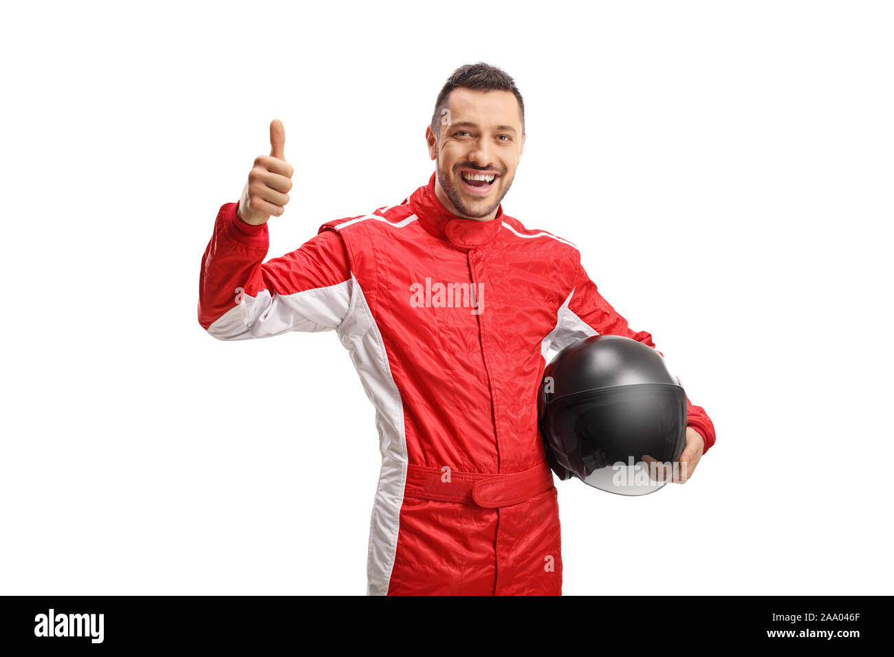 Smiling male car racer with a helmet showing a thumb up sign isolated ...