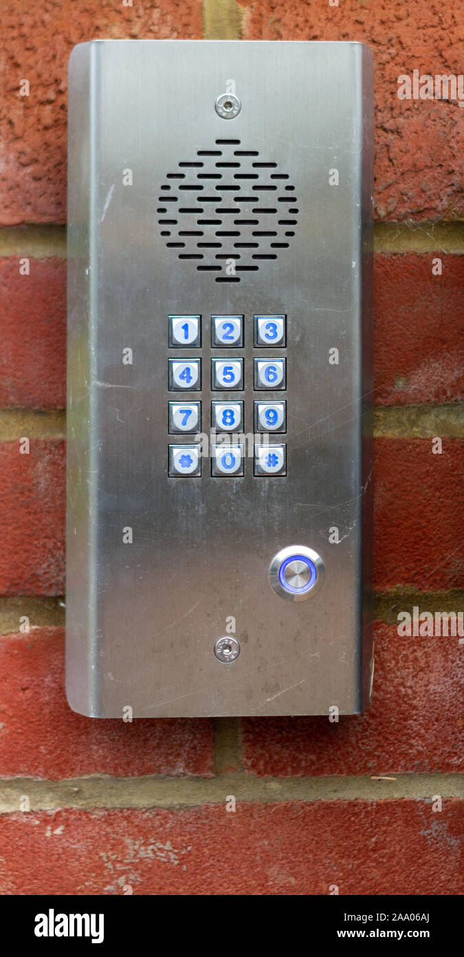 Metal security keypad as entry mechanism on a gate Stock Photo - Alamy