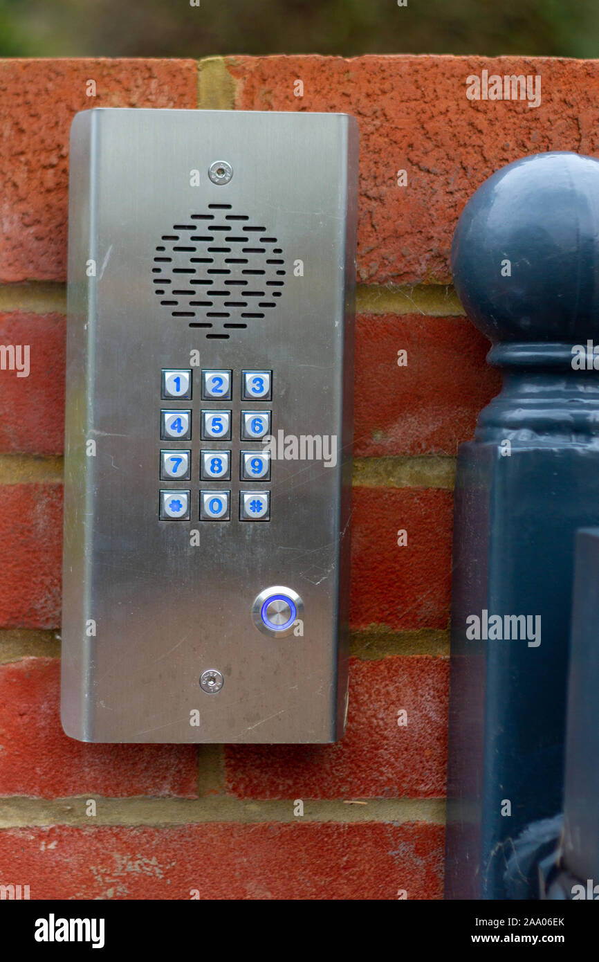 Metal security keypad as entry mechanism on a gate Stock Photo - Alamy