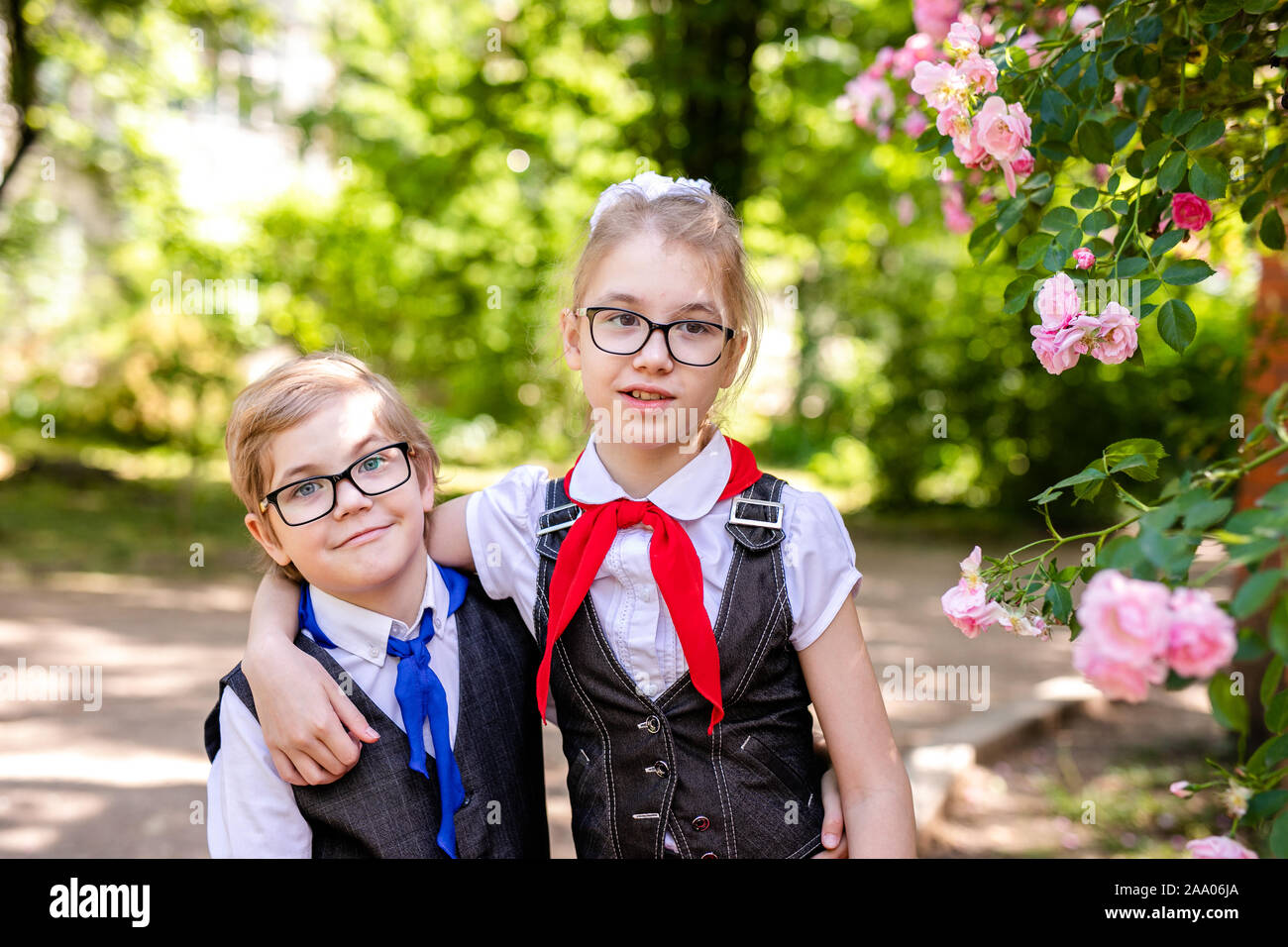 two primary student wearing school uniform. russian elementary school ...