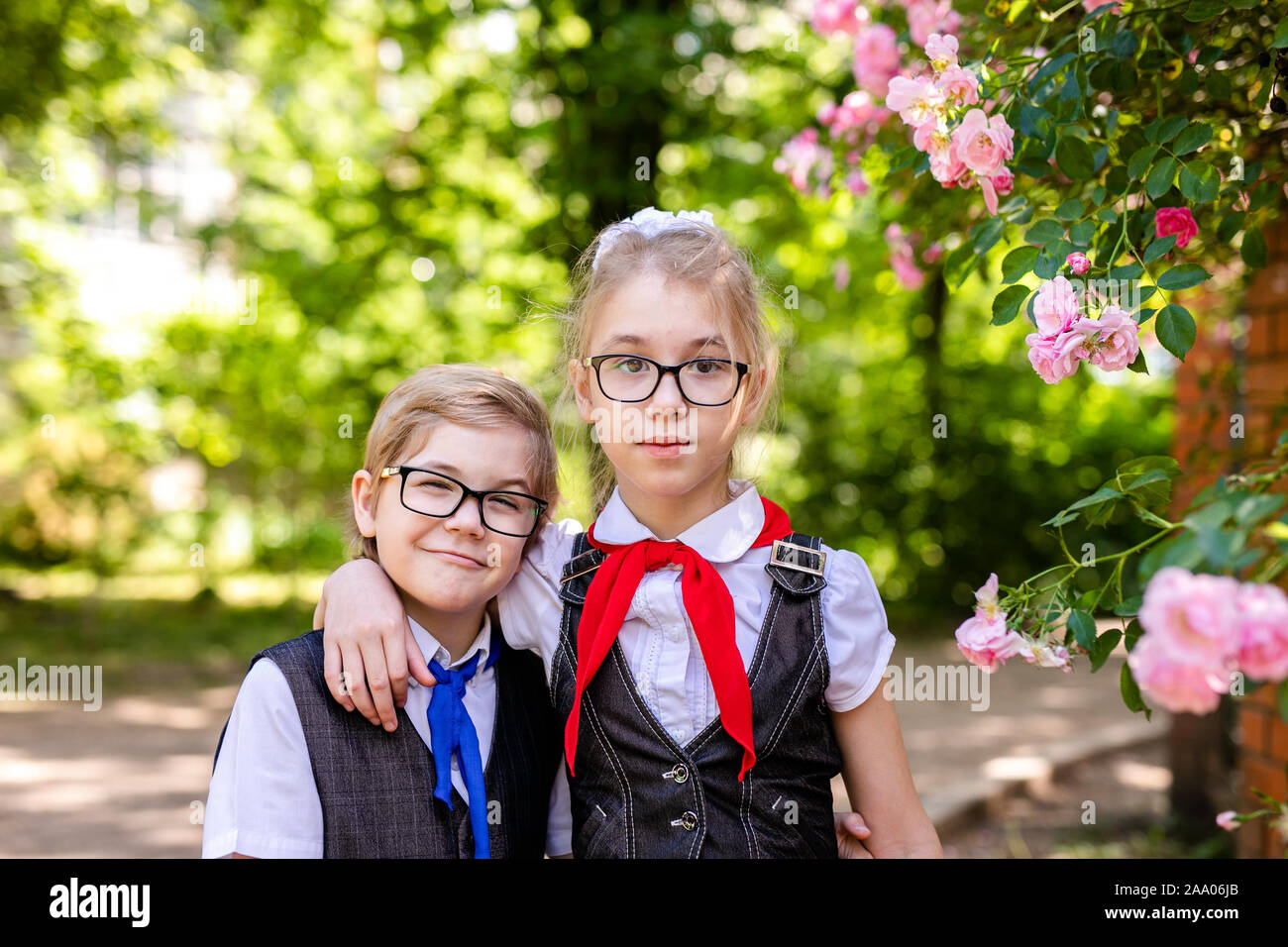 two primary student wearing school uniform. russian elementary school ...