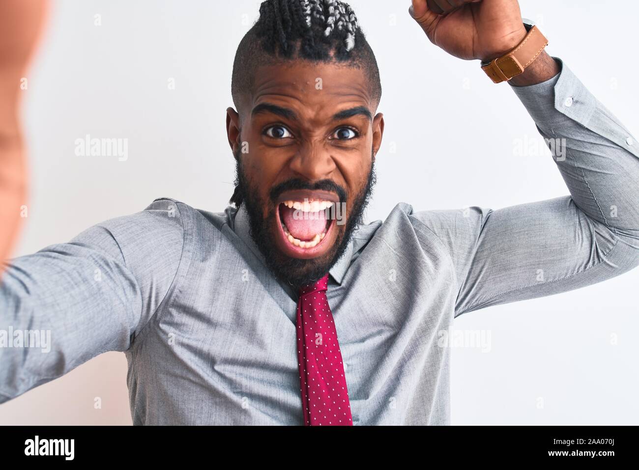 African american businessman make selfie by camera over isolated white ...