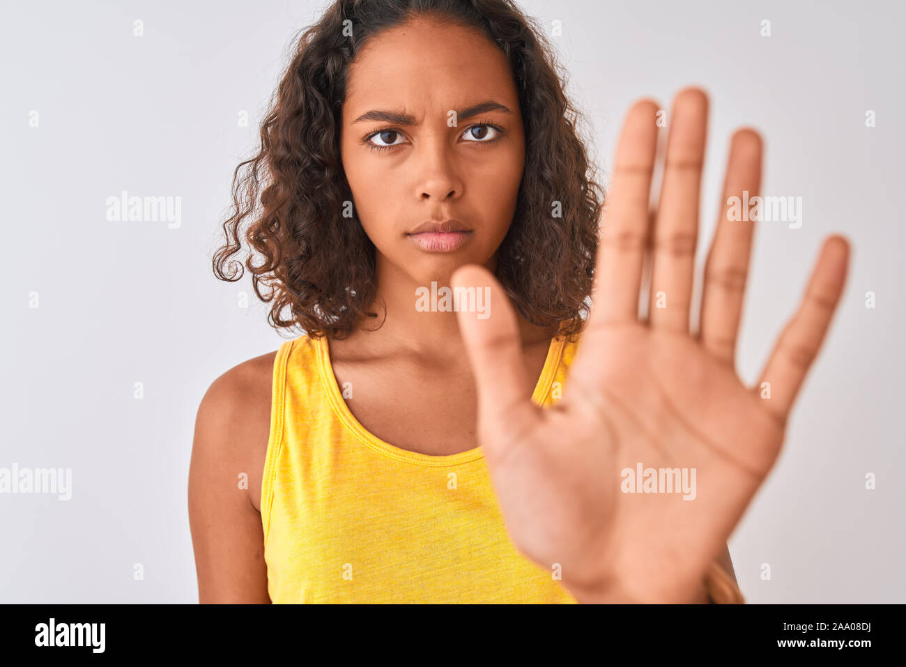Young Brazilian Woman Wearing T Shirt Standing Over Isolated White