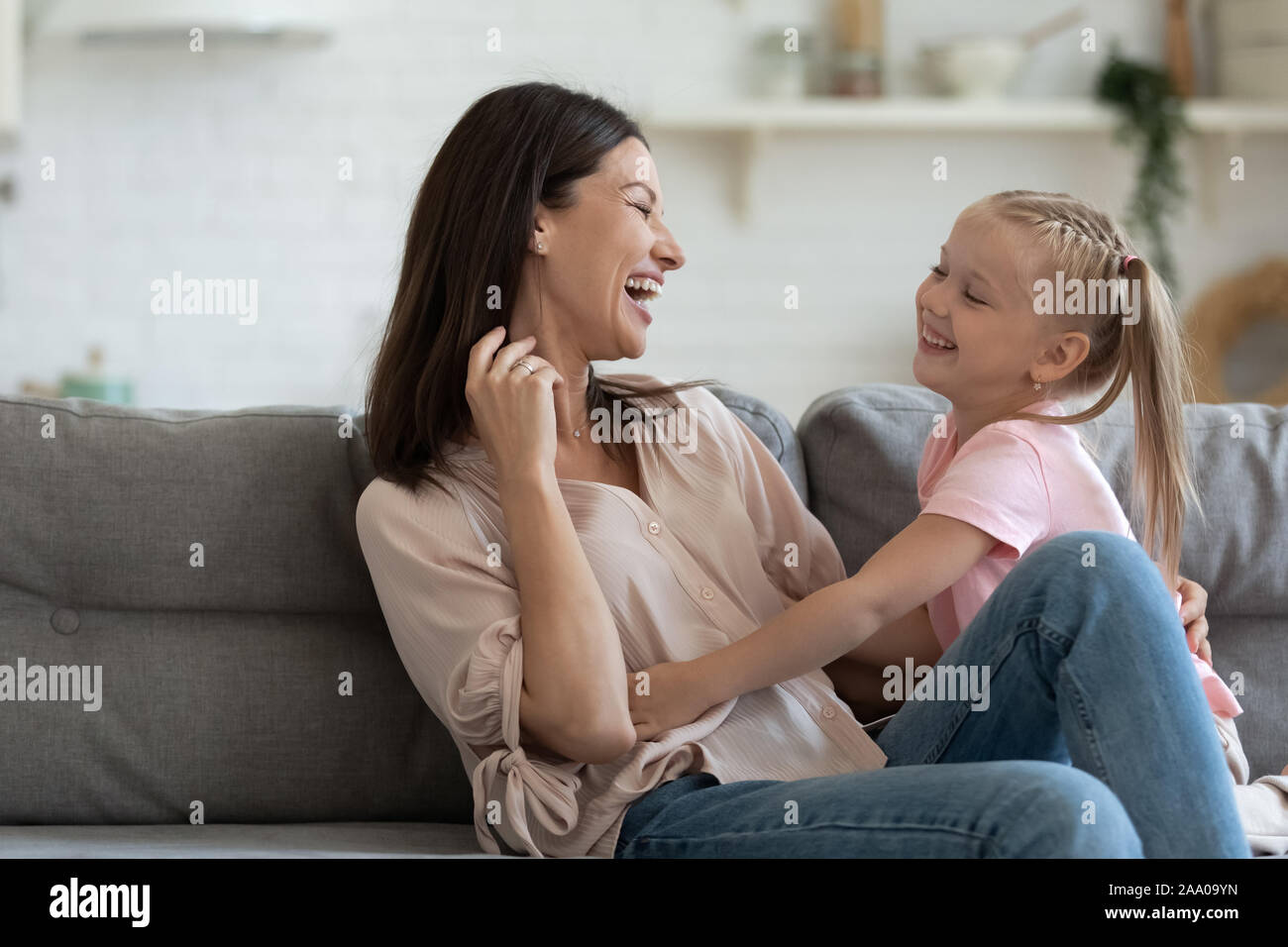 Tickle laughing laughter hi-res stock photography and images - Alamy