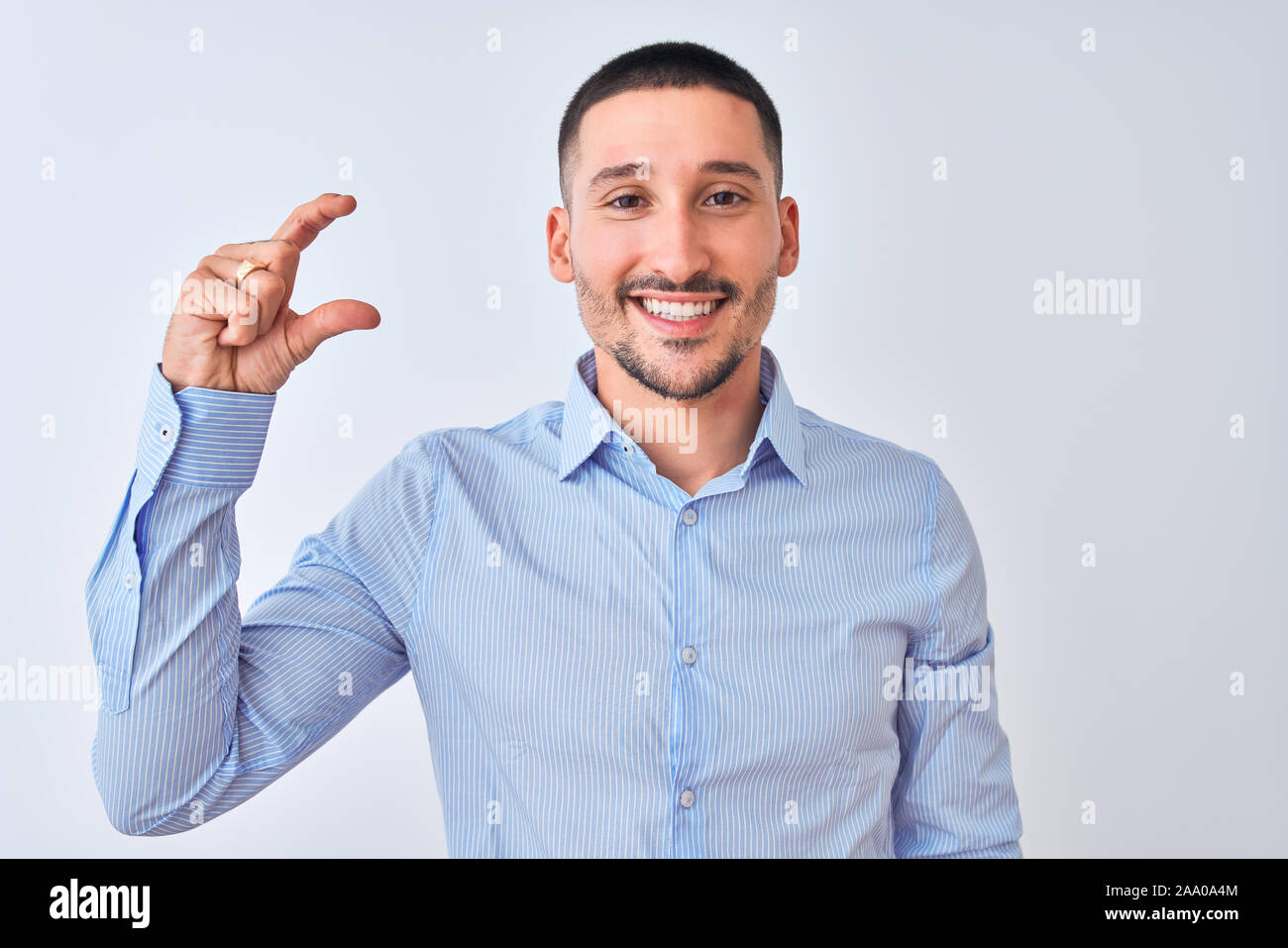 Young handsome business man standing over isolated background smiling ...