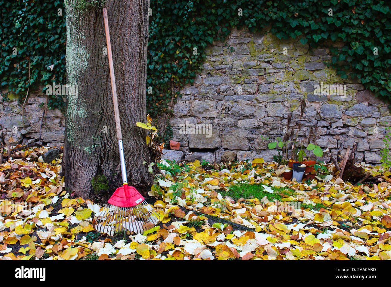 Leaning resting on rake hi-res stock photography and images - Alamy