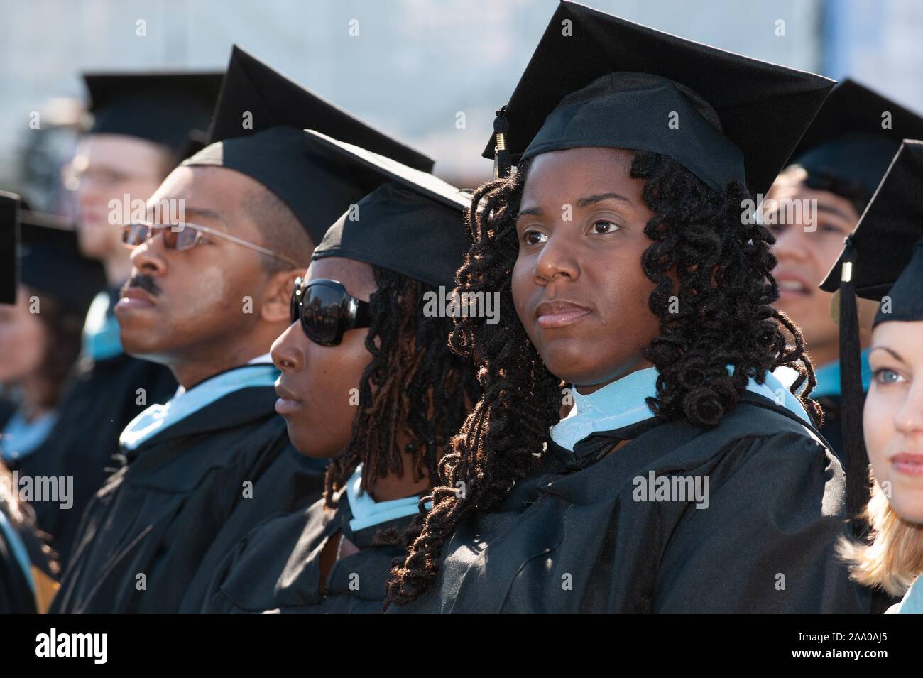 Students and faculty participate in a commencement or graduation ...