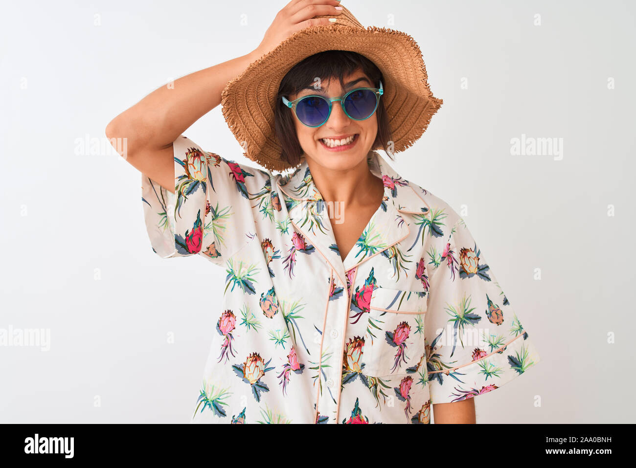 Woman on vacation wearing summer hat shirt and sunglasses over isolated ...