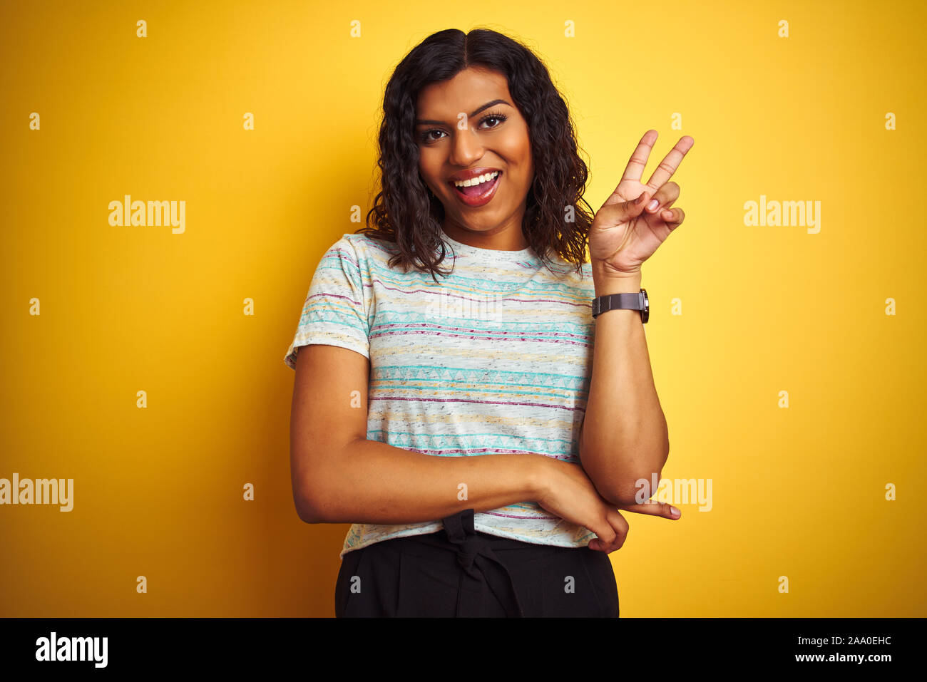 Beautiful transsexual transgender woman wearing t-shirt over isolated ...