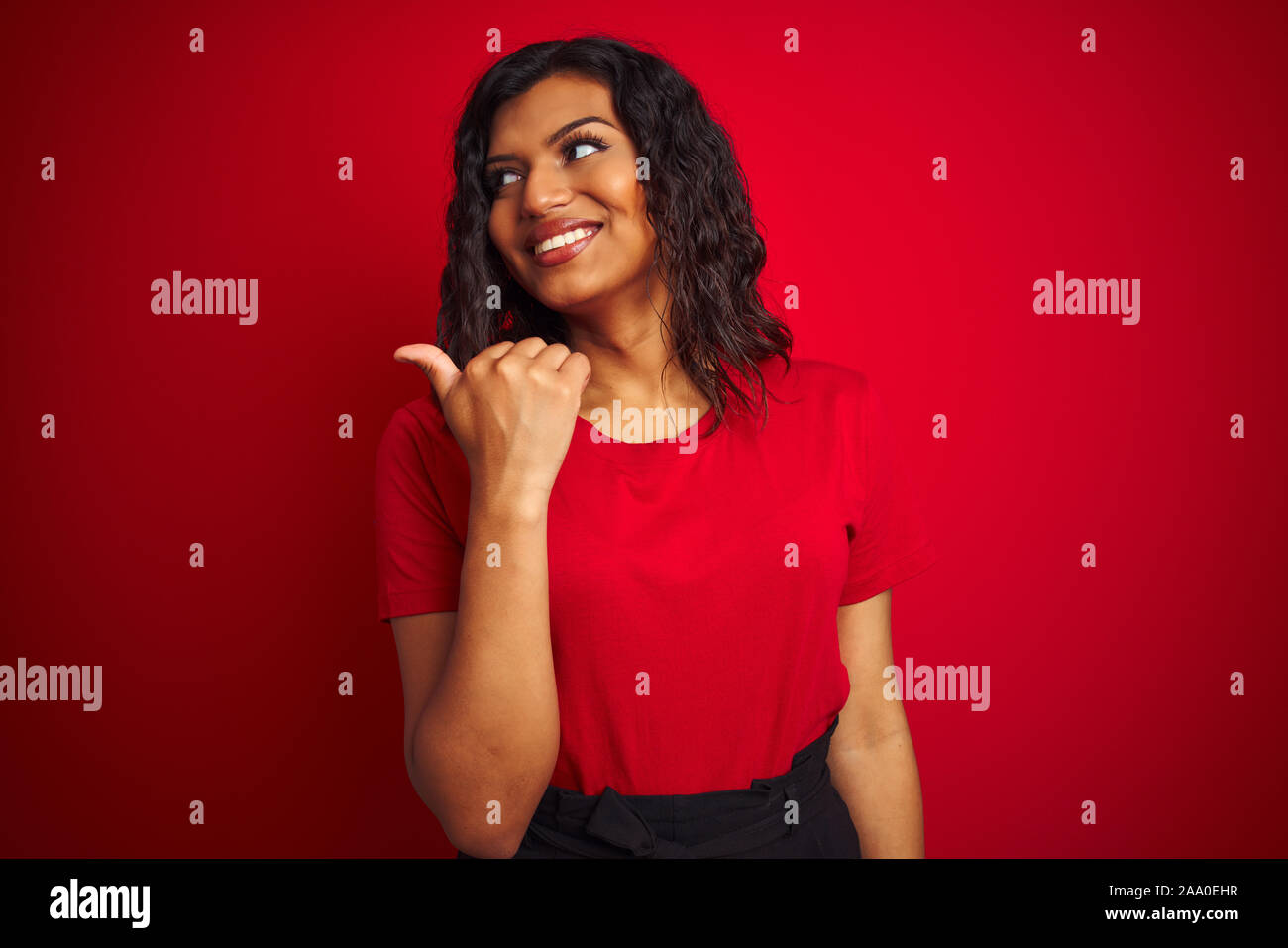 Beautiful transsexual transgender woman wearing t-shirt over isolated ...