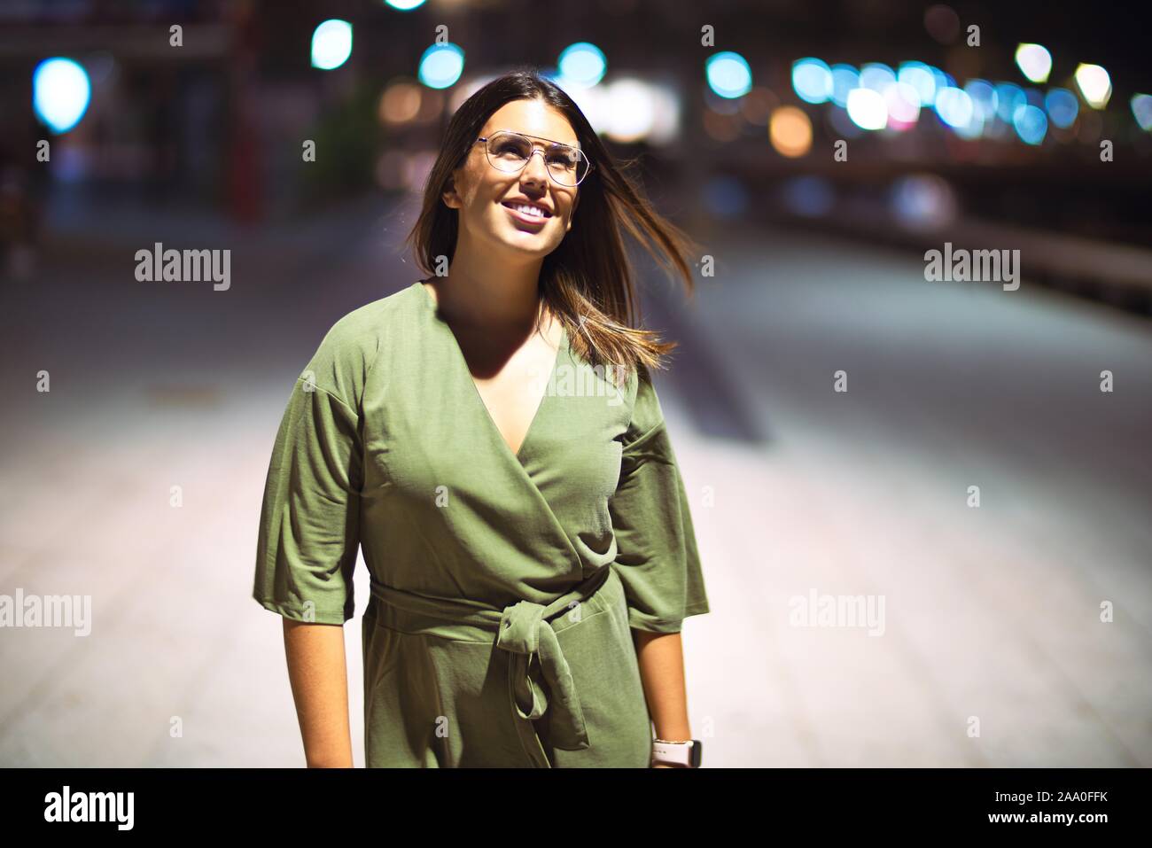 Young beautiful girl smiling happy and confident walking at the ...