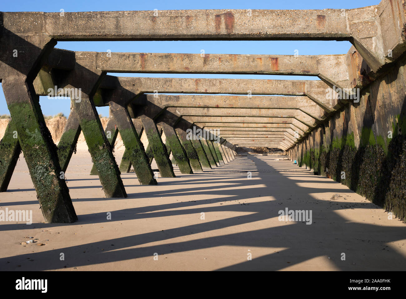 Old concreate pier, Walberswick, Suffolk Stock Photo - Alamy
