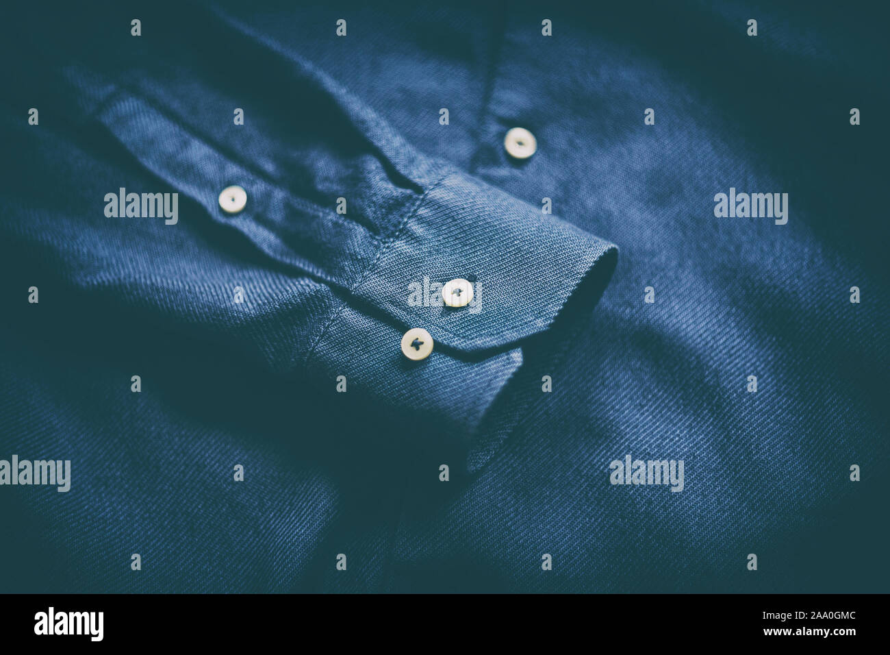 Blue Shirt Sleeve with Buttons. Blue fabric texture. Tailor background ...