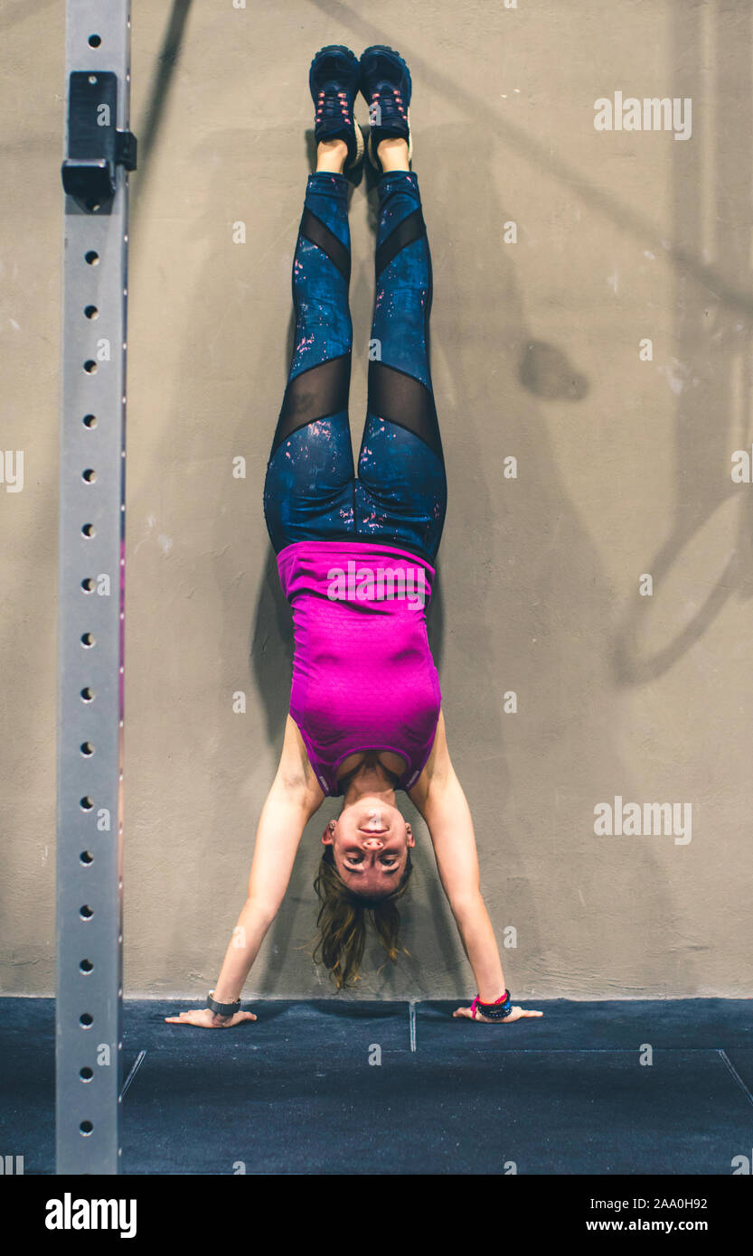 Girl doing handstand hi-res stock photography and images - Alamy