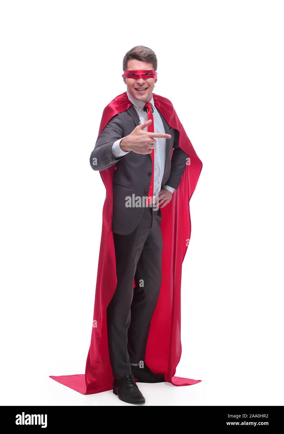 in full growth. superhero businessman pointing the right direction ...