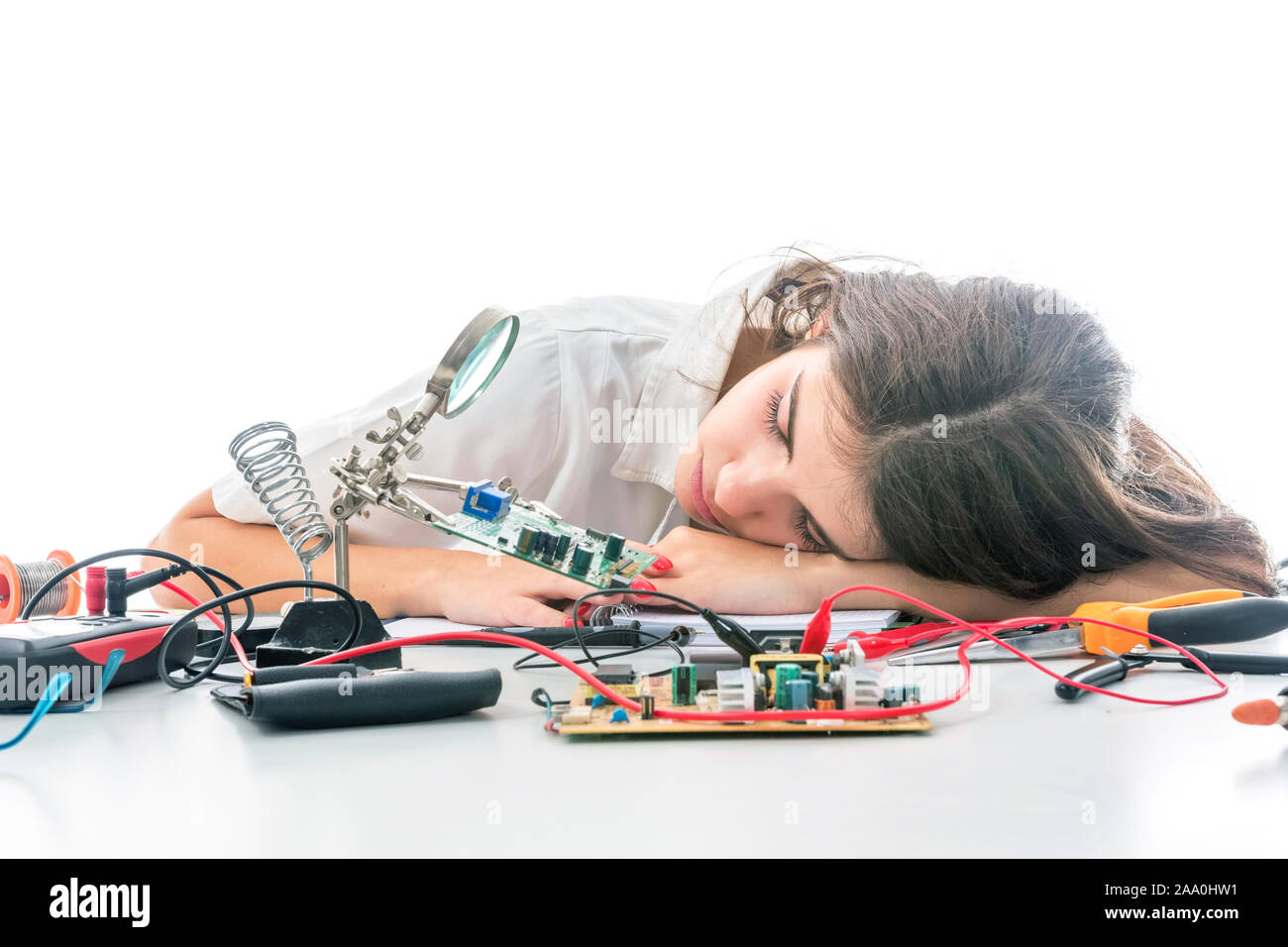 Woman Electronic Technician Sleeping, Overworked and Tired Stock Photo ...