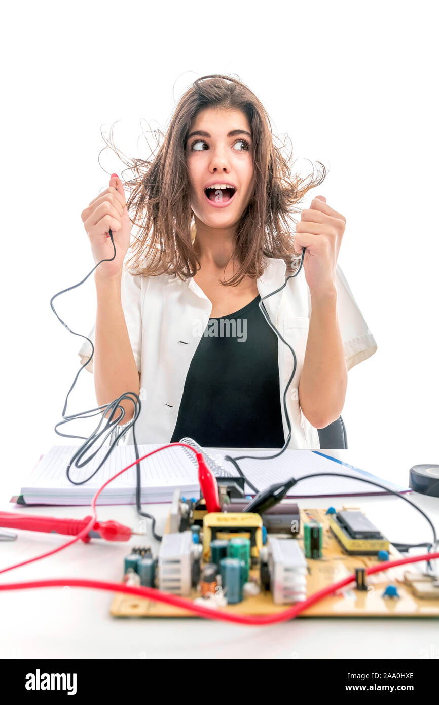 Girl having Electric Shock, electricity problems, Girl holds bare wires ...